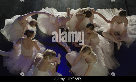 Overhead view of serious ballet dancer dancing in costume Stock Photo ...