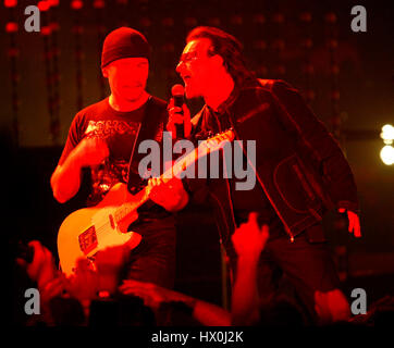 The Edge (L) and Bono of the band U2 perform in concert at the Stade de ...