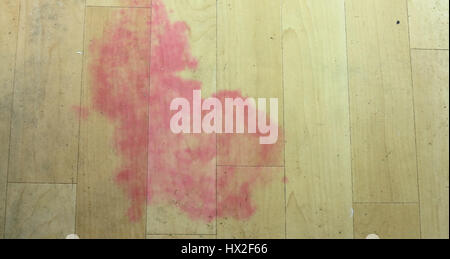 Pink stain caused by mould on vinyl flooring Stock Photo - Alamy