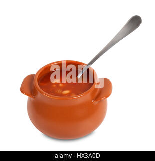 Russian soup in a clay pot, next to bread, sour cream, greens, lard on ...