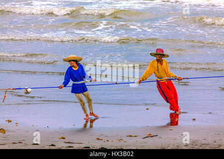 Fishing cooperative haul in their seine net at Baybay Beach, Roxas City ...