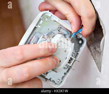 light switch replacement, installation light switches inside wall Stock ...