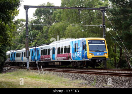 Melbourne metro train travelling between Ferntree Gully and Boronia ...