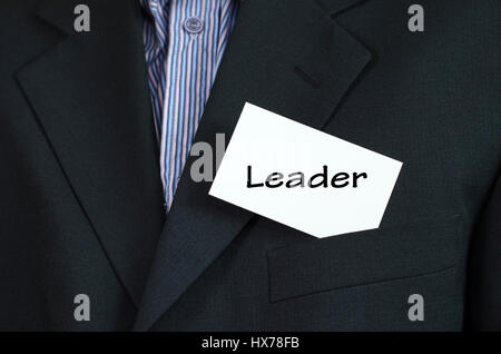 Leader text note concept over business man background Stock Photo - Alamy