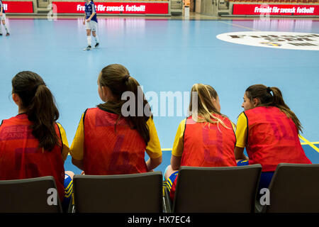 Girls playing football at a futsal tournament Stock Photo - Alamy