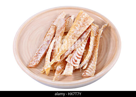 Salted fillets of dried white fish displayed for sale in the covered ...