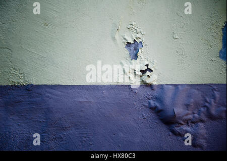 Rotten concrete wall with blown paint Stock Photo - Alamy
