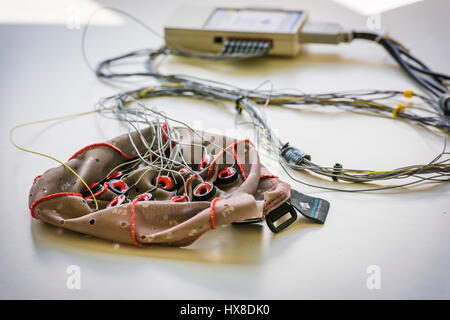 Wired electrodes on a Brain-Computer Interface (BCI) hood that is used to translate brain ...