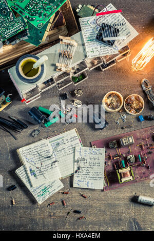 Electronics work desk in laboratory on old wooden table Stock Photo - Alamy