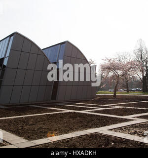 The arched exterior of the De Ploeg factory, designed by Gerrit ...