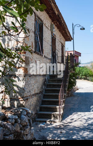 Beautiful shot of an old stone empty bridge and the sun shining through ...