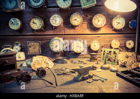 Vintage watchmaker's room with many clocks Stock Photo - Alamy