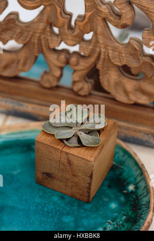 Bouquet of dried flowers placed on green background Stock Photo - Alamy