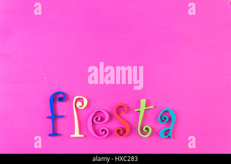 Word Fiesta on a bright painted wood background Stock Photo - Alamy