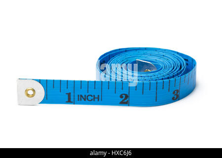 Measuring tape on blue background Stock Photo - Alamy