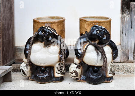 Kyoto, Japan. Figurines of Tanuki (lucky raccoons) at Shoden-ji, a Zen ...