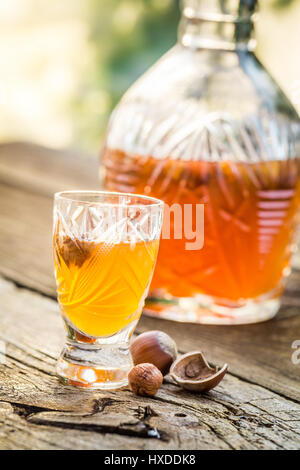Tasty liqueur made of alcohol and nuts Stock Photo - Alamy