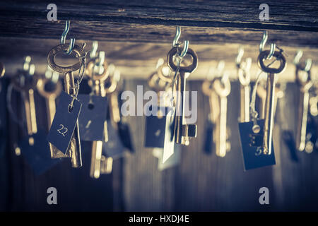 Aged keys for hotel rooms Stock Photo - Alamy