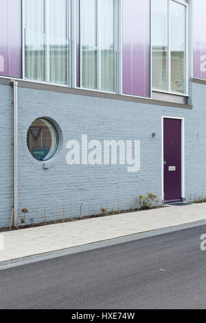 Mauve painted front entrance door to a cottage in ireland Stock Photo ...