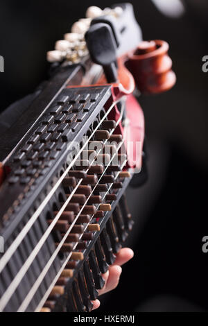 hands of a nyckhelharpor playing this handcrafted ancient traditional ...