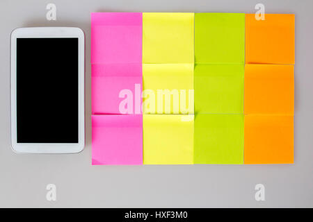 post it notes colorful blank next to mobile phone Stock Photo - Alamy