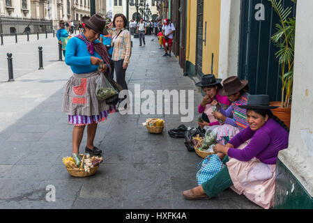 Peruvian people selling local products at scenic site for tourists ...