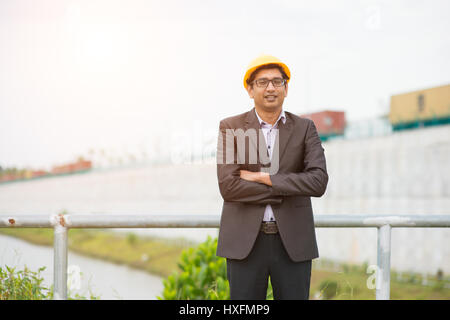 indian male engineer by the lakeside Stock Photo - Alamy