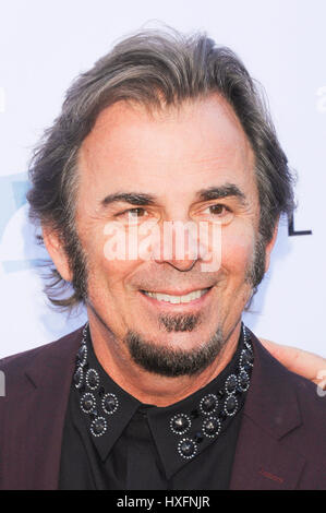 Jonathan Cain of rock band Journey with wife Paula attends the opening ...