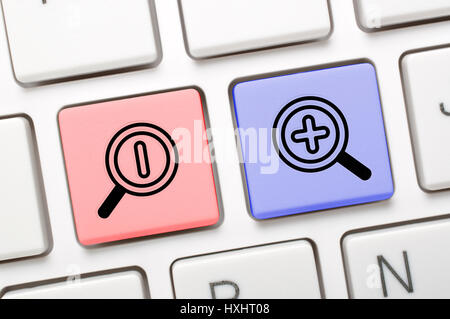zoom in zoom out button Stock Photo - Alamy