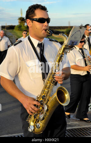 Playing saxophone in a marching band Stock Photo - Alamy
