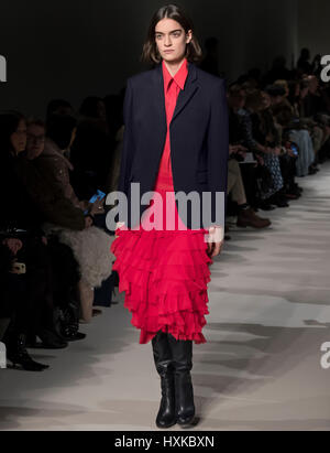 A model walks the runway during the Celine show as part of the Paris ...