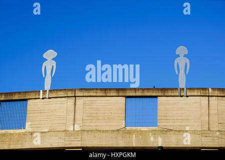 metal statue human figure on a building Stock Photo - Alamy