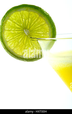Yellow bird cocktail with white rum, liquor and lime juice in martini ...
