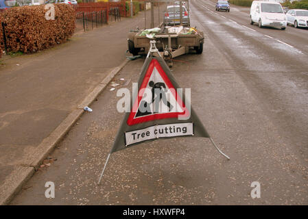 Tree cutting safety sign and cone on the street warning about of Stock ...