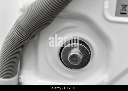 Transit bolts at the back of a domestic washing machine Stock Photo - Alamy