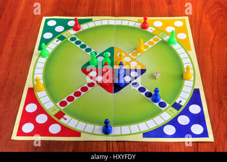 Colorful board for playing traditional children's game Stock Photo - Alamy