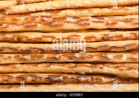 Long thin biscuit sticks background Stock Photo - Alamy
