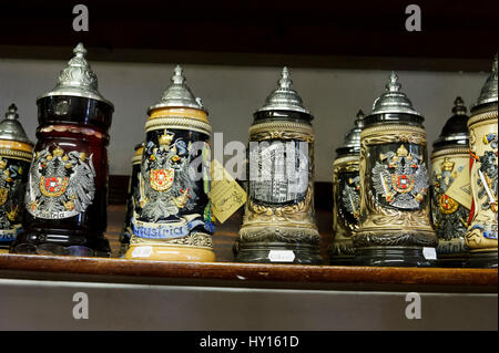 A selection of colourful and ornate Beer tankards on sale in Innsbruck ...