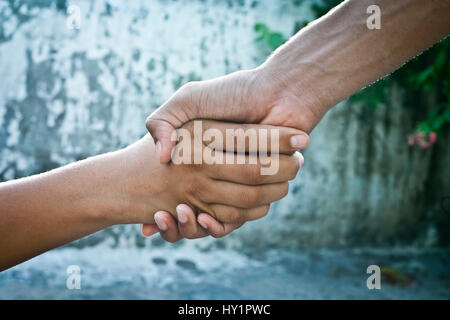 Team work. Human hands joined together Stock Photo - Alamy
