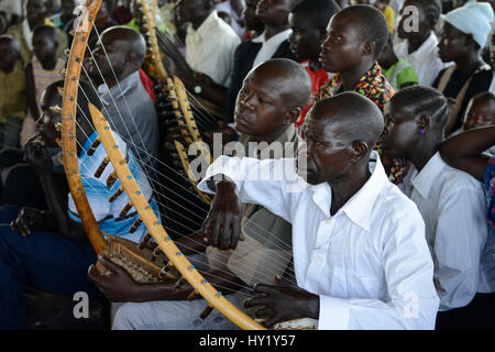 UGANDA, Arua, holy mass on sunday, musician play Enanga string ...