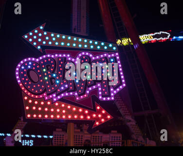 The colorful light trails for the Twister fairground ride at Woodstock ...