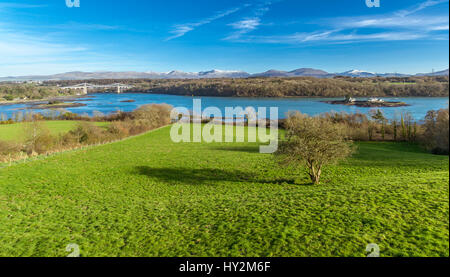 A view across the Menai Strait from a vantage point on Anglesey, with ...