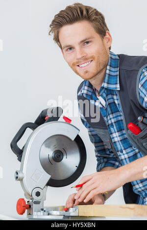 Hand bending a ruler Stock Photo - Alamy