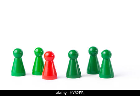 A unique red token between green tokens Stock Photo - Alamy