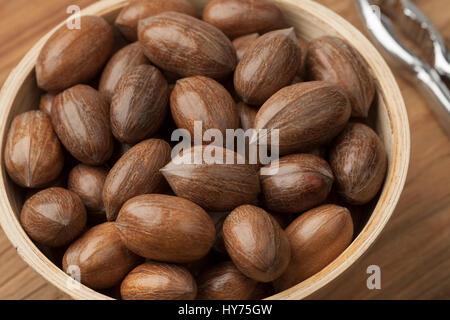 Pecan Nuts with Shell in Wooden Bowl / Walnuts. Organic Food Stock ...
