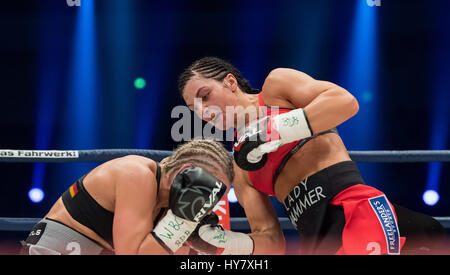 Dortmund, Germany. 01st Apr, 2017. German boxer Christina Hammer (L) in ...