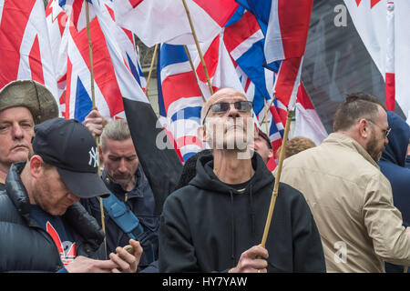 Police wait with anti racist supporters for the Britain first Protest ...