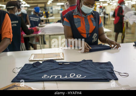 Textile workers producing clothing at a factory in Kampala, Uganda ...