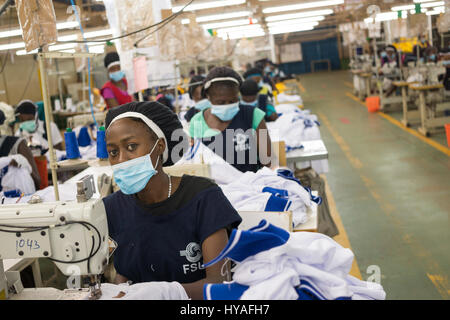 Textile workers producing clothing at a factory in Kampala, Uganda ...