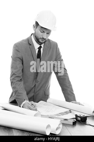 Handsome businessman with helmet drawing Stock Photo - Alamy